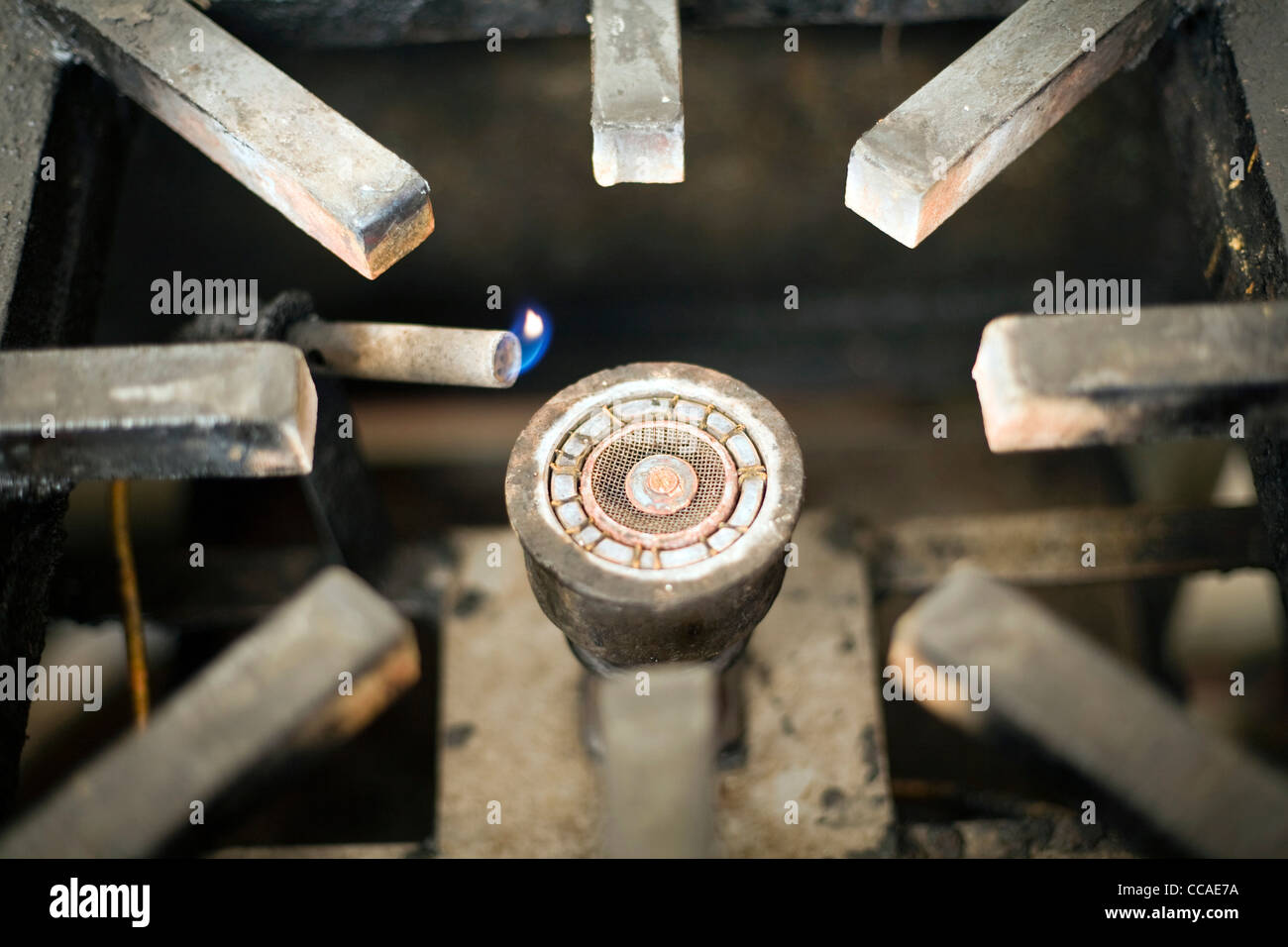 A gas burner and gas ring on a range cooker in the kitchens at Moti ...