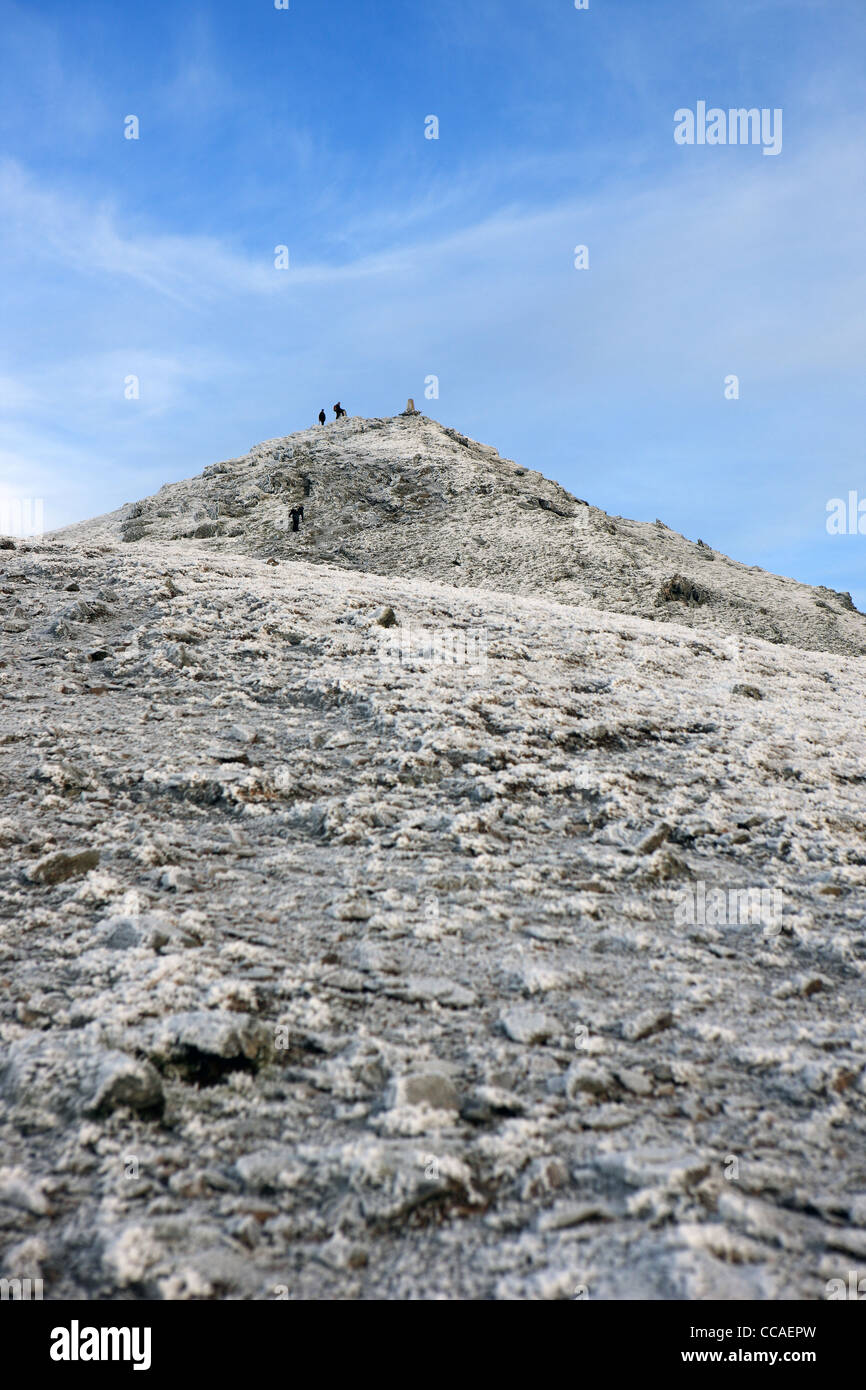 Walkers reaching the icy summit of Ben Lawers in Perthshire, Scotland ...