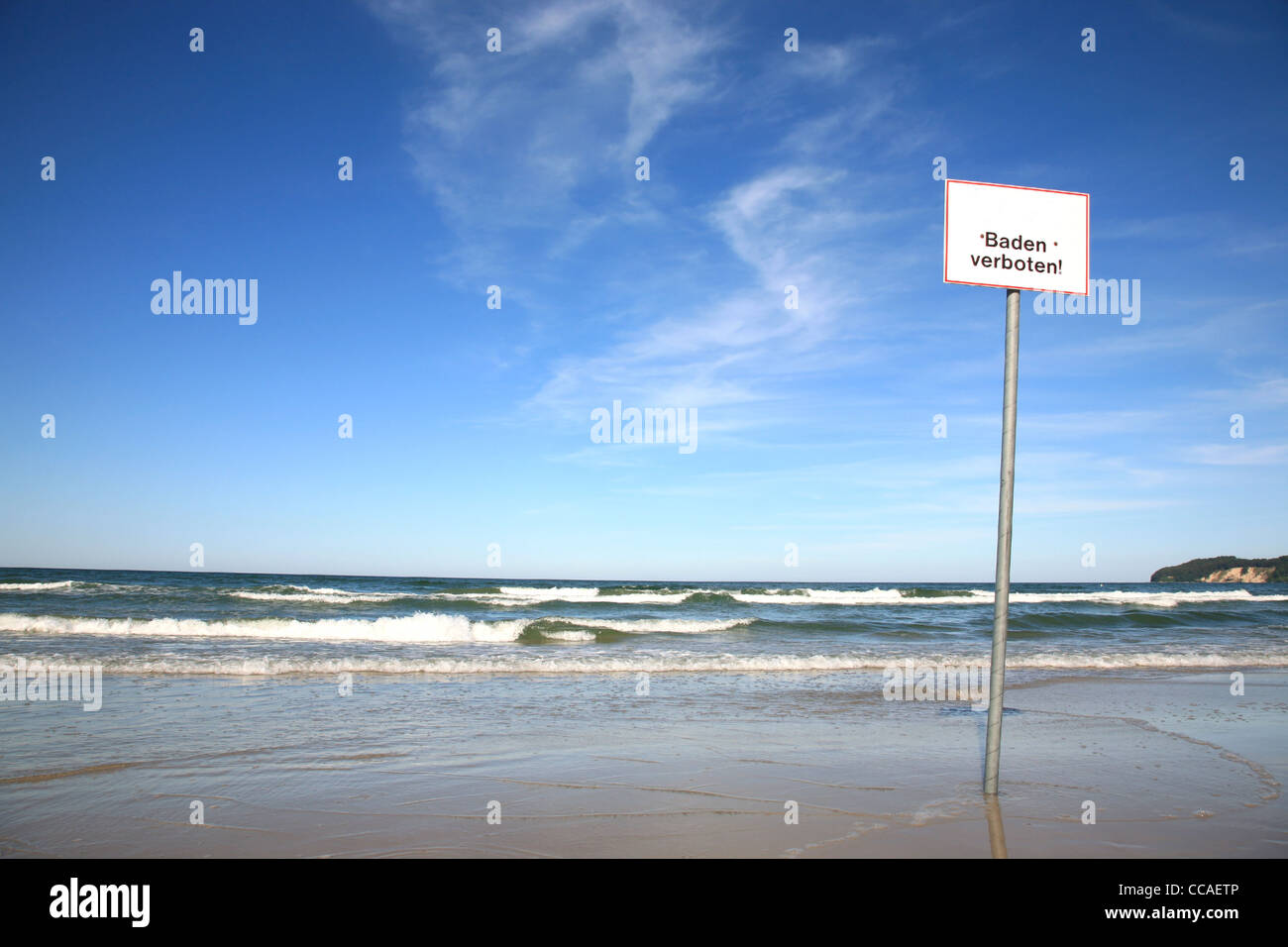 Beach and signpost Stock Photo - Alamy
