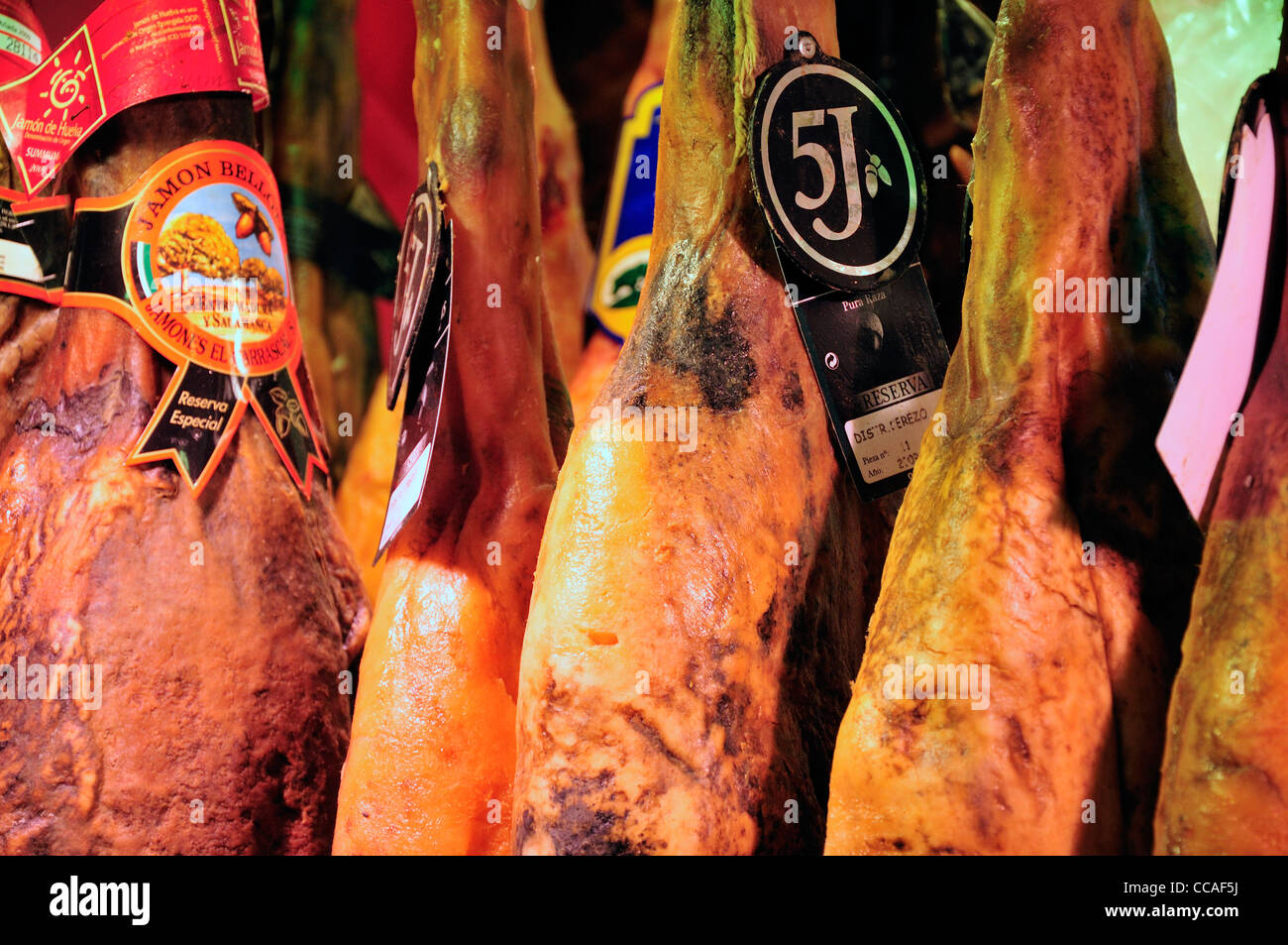 Barcelona, Spain. La Boqueria market. Hams / Jamon hanging up Stock ...