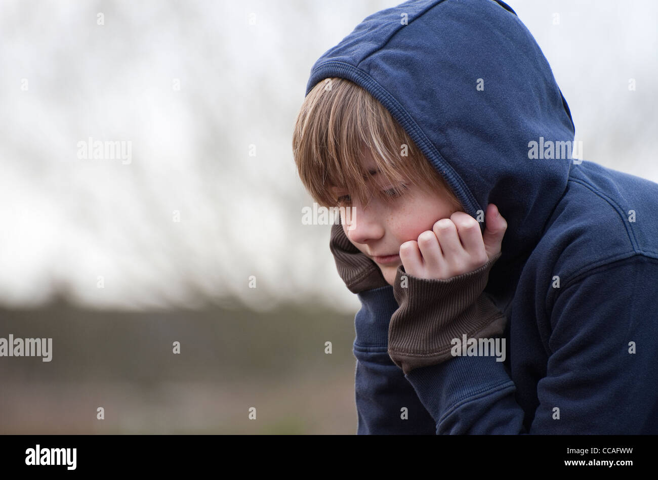 depressed, lonely young male boy Stock Photo - Alamy