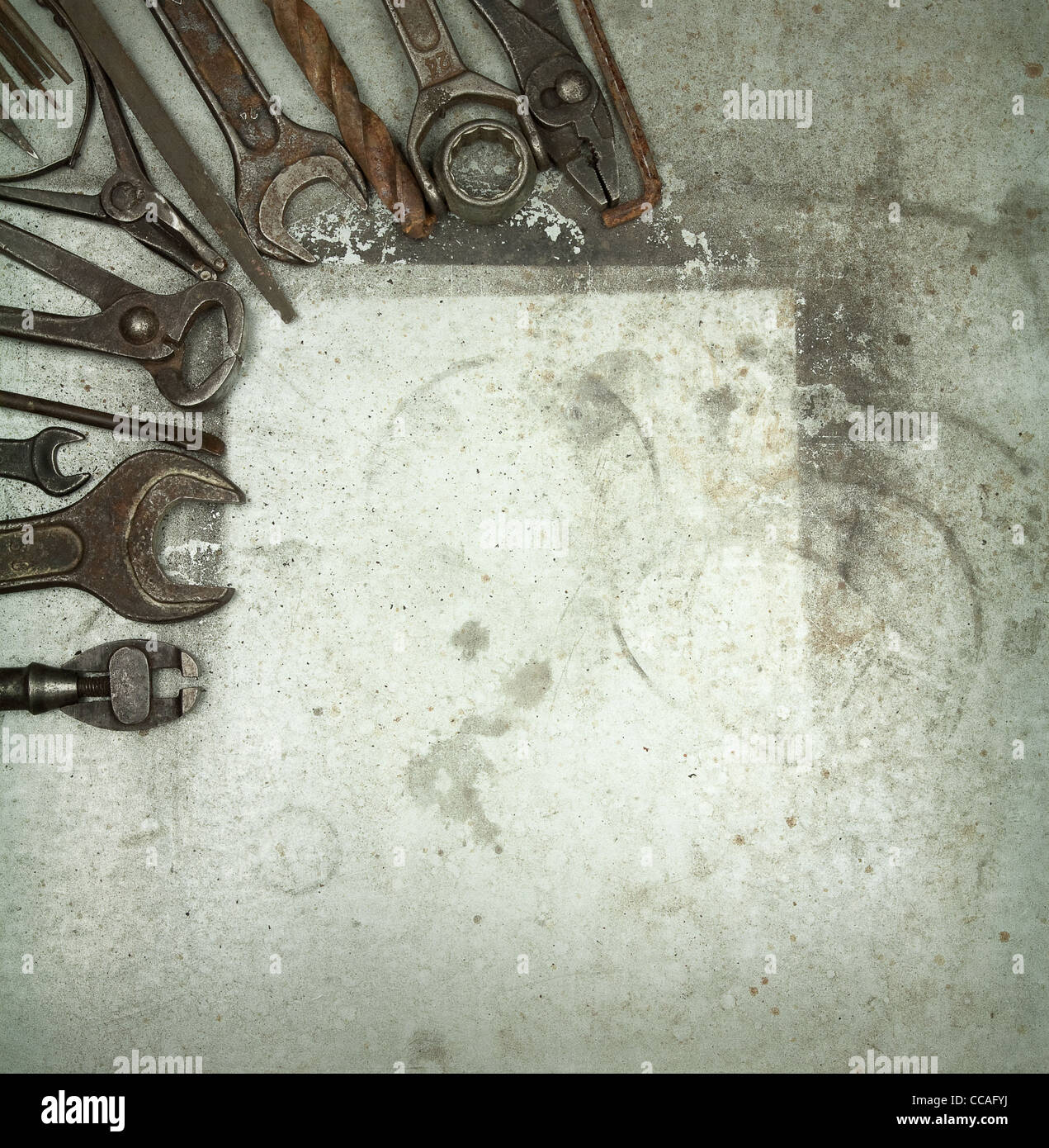 Heap of old tools on a metal background Stock Photo - Alamy