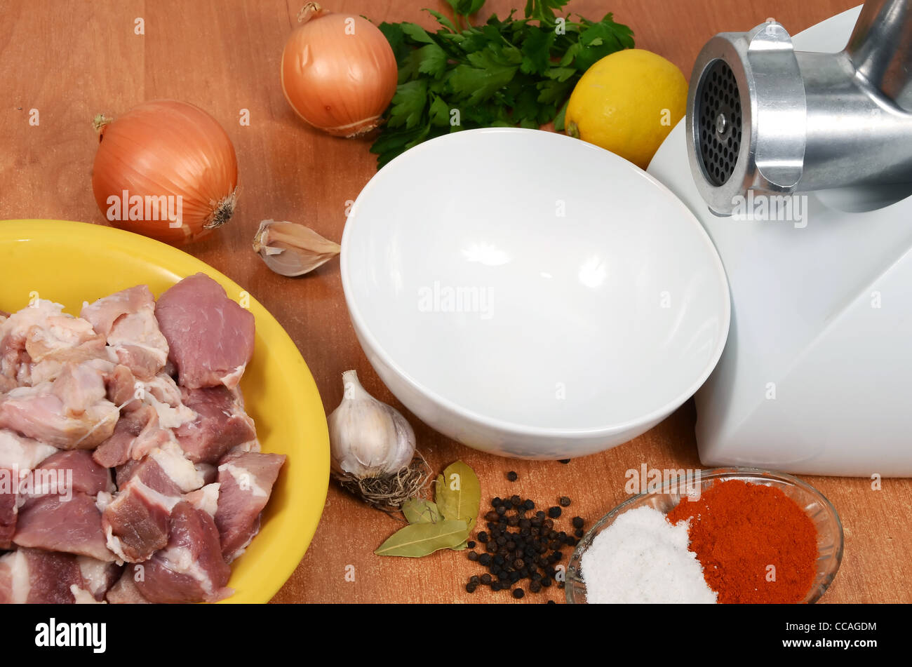 raw meat with spices and meat grinder for preparation of stuffing Stock ...