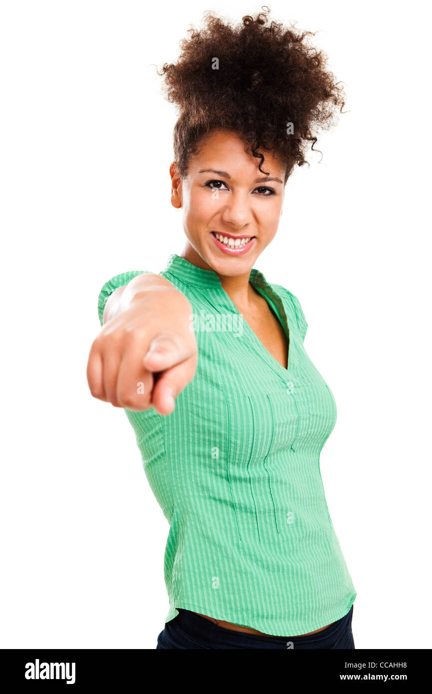 Happy smiling woman pointing. Studio shot with isolated white ...