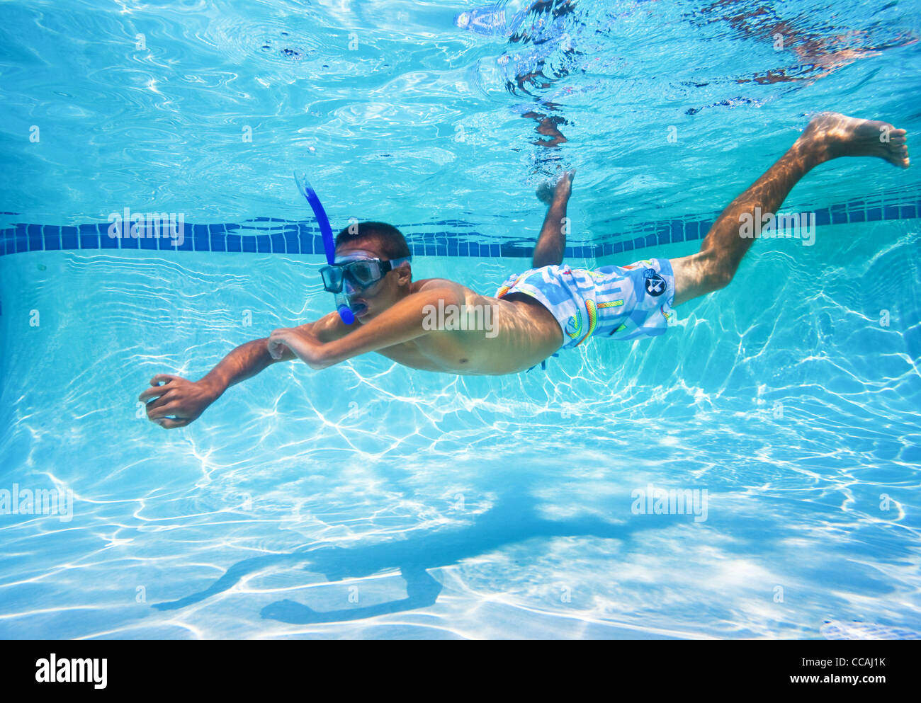 Young men dive in swimming hi-res stock photography and images - Alamy