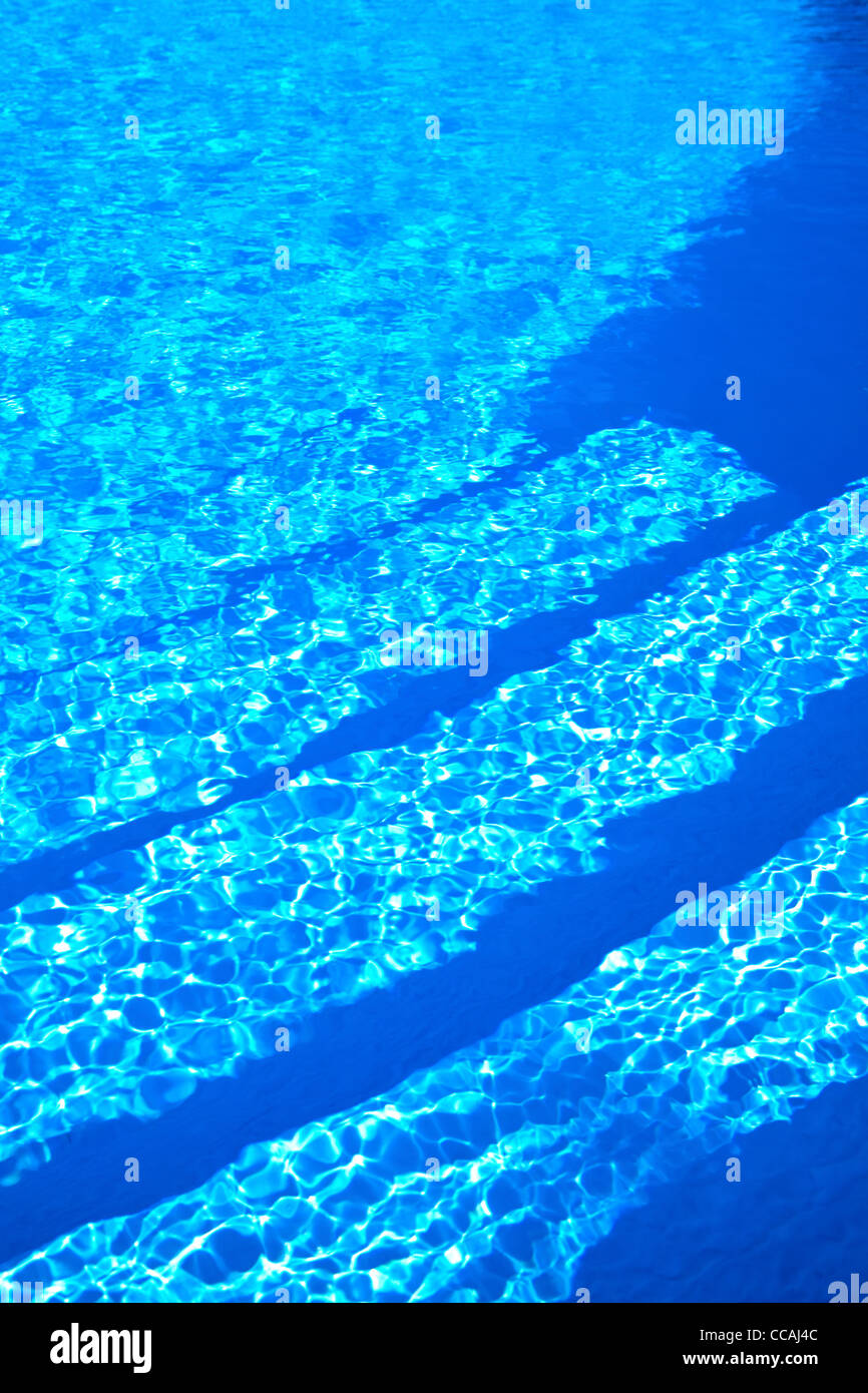 Close-up of beautiful blue water ripples in a swimming pool Stock Photo ...