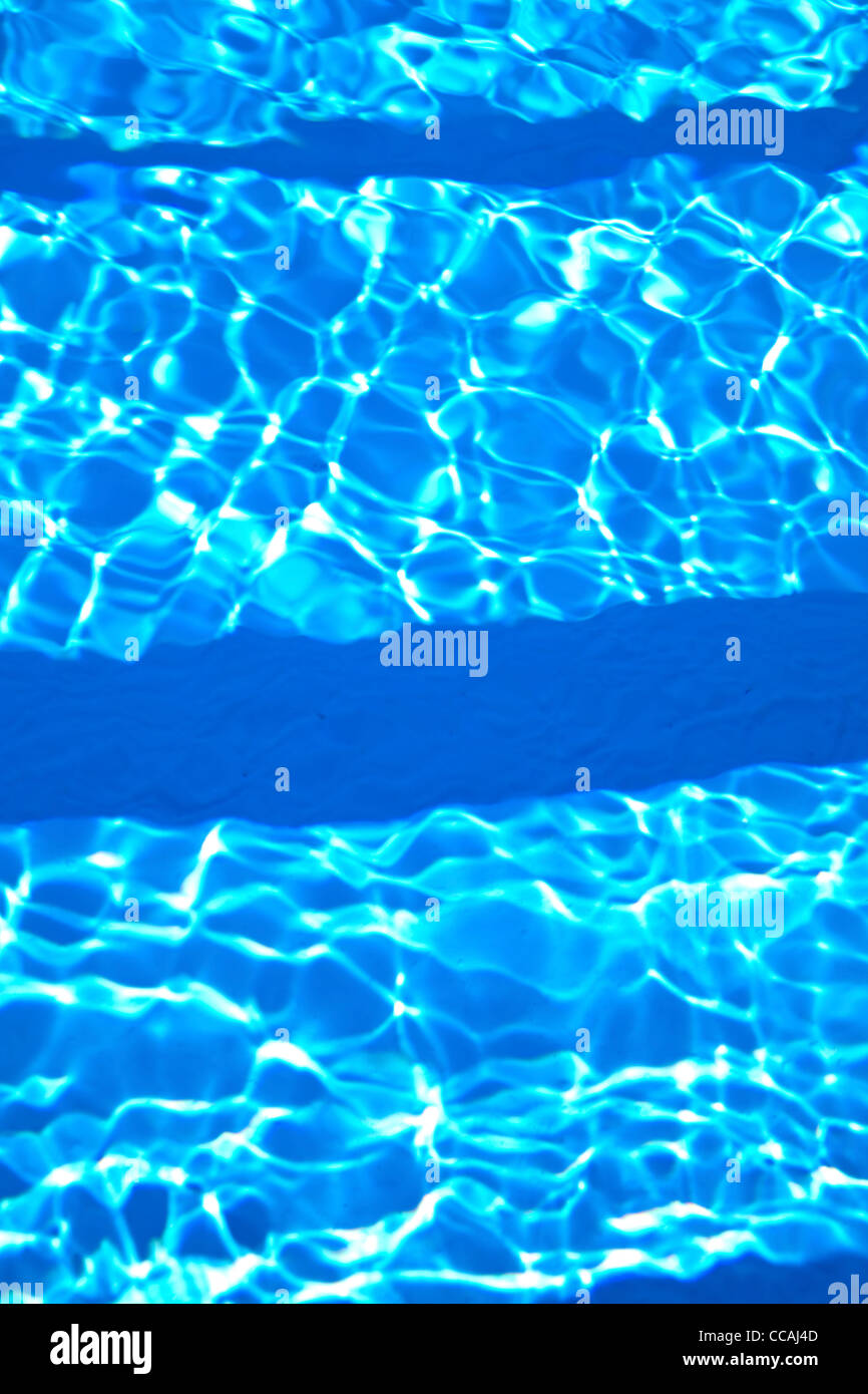 Close-up of beautiful blue water ripples in a swimming pool Stock Photo ...