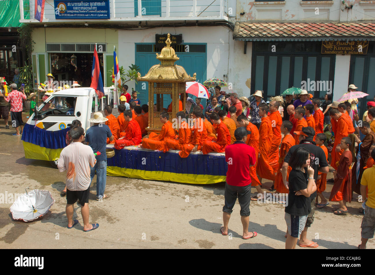 Buddhist monks in procession on a float on Mue Nau, the middle day of ...