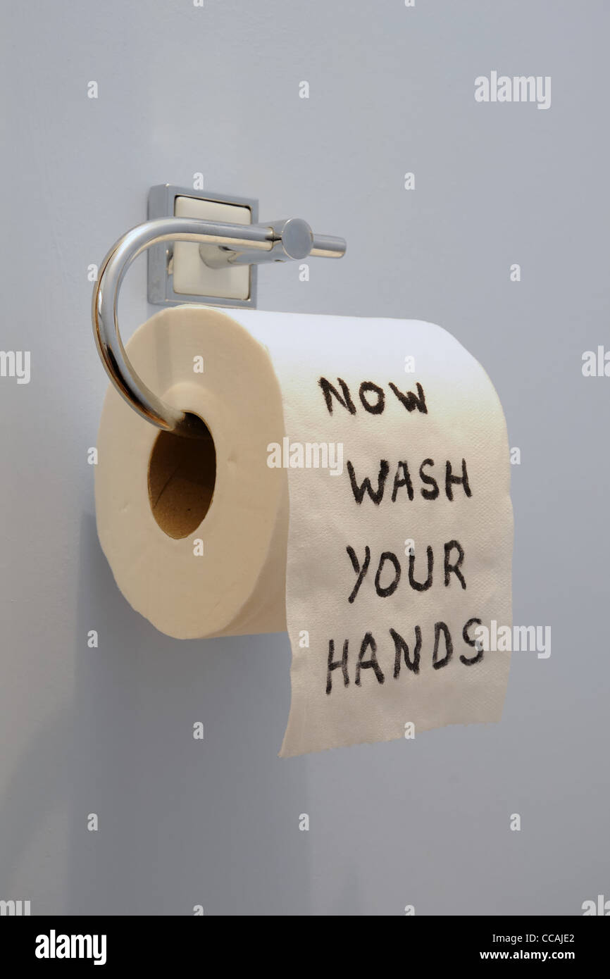 Reminder to wash hands written on toilet paper Stock Photo - Alamy