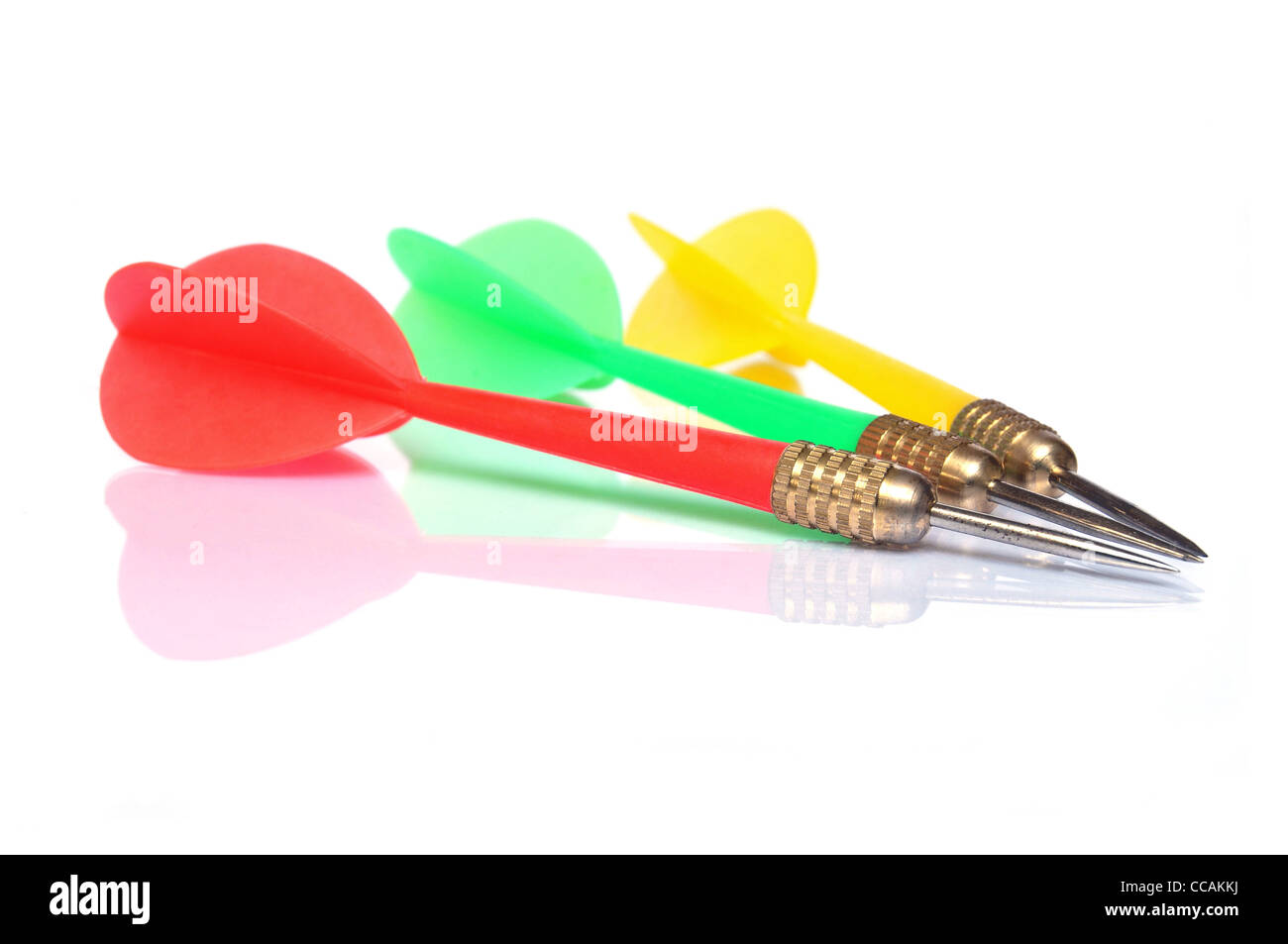 Group of multicolored darts on white background Stock Photo - Alamy