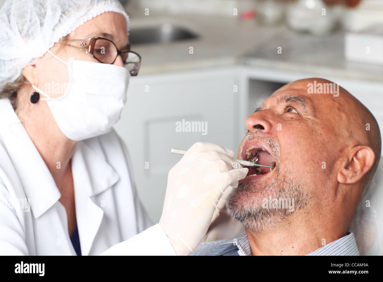 man at dentist Stock Photo - Alamy