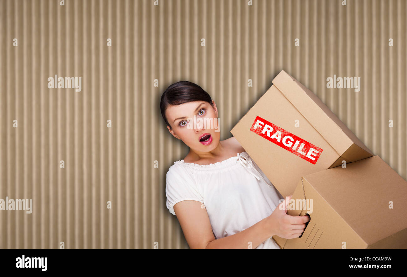Closeup Portrait of a young woman with boxes Stock Photo - Alamy