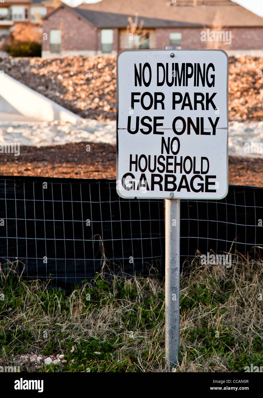 No Dumping Sign in Park - No Household Garbage Stock Photo - Alamy