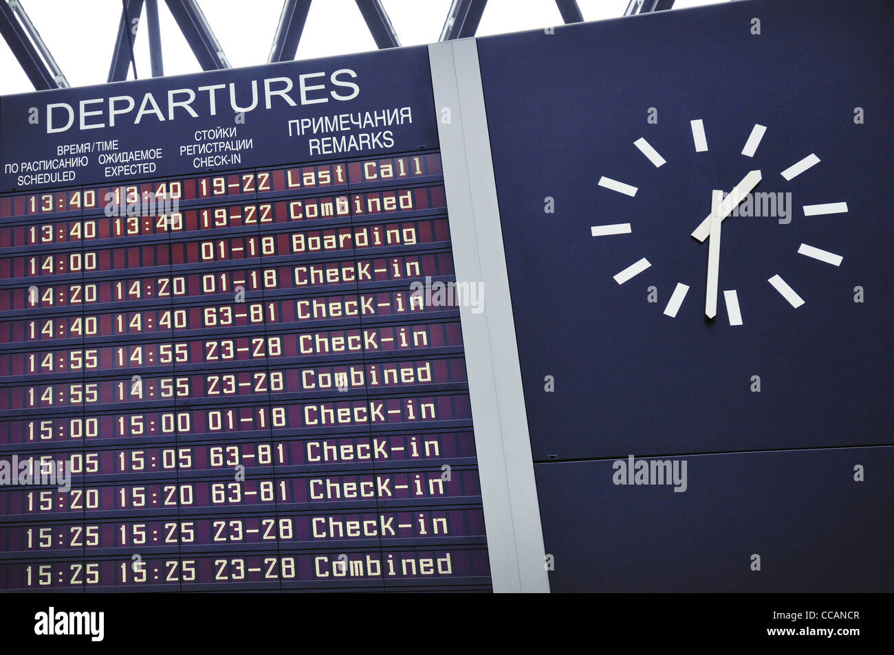 big timetable board with watches and departure time lines Stock Photo ...