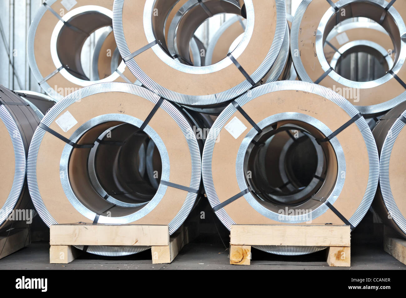 packed rolls of steel sheet Stock Photo - Alamy