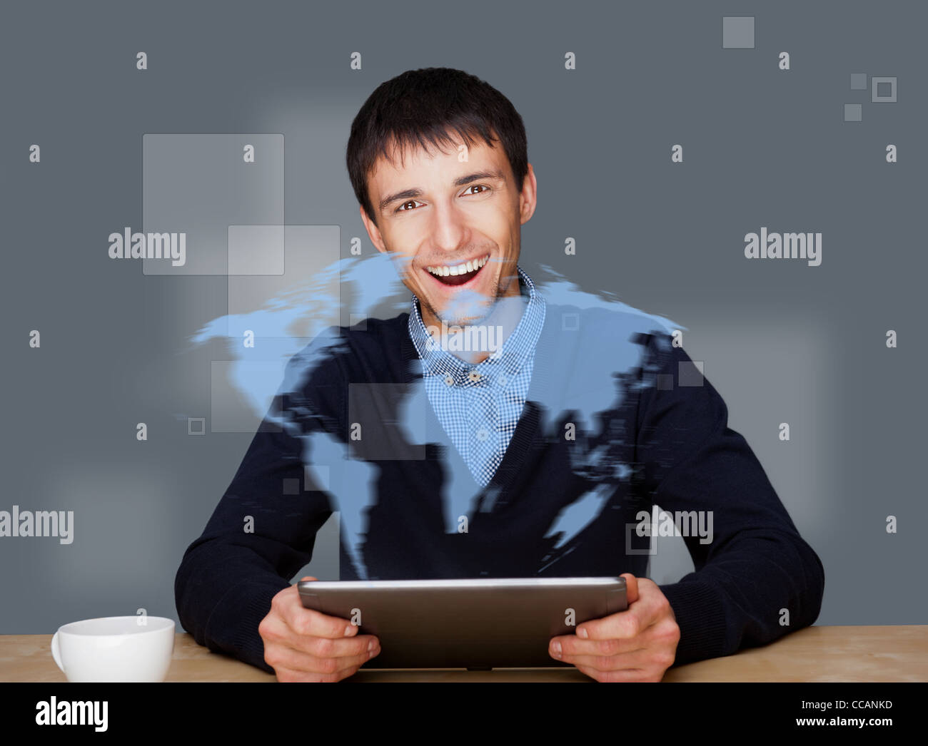 Portrait of young handsome laughing man chatting with his friends using ...