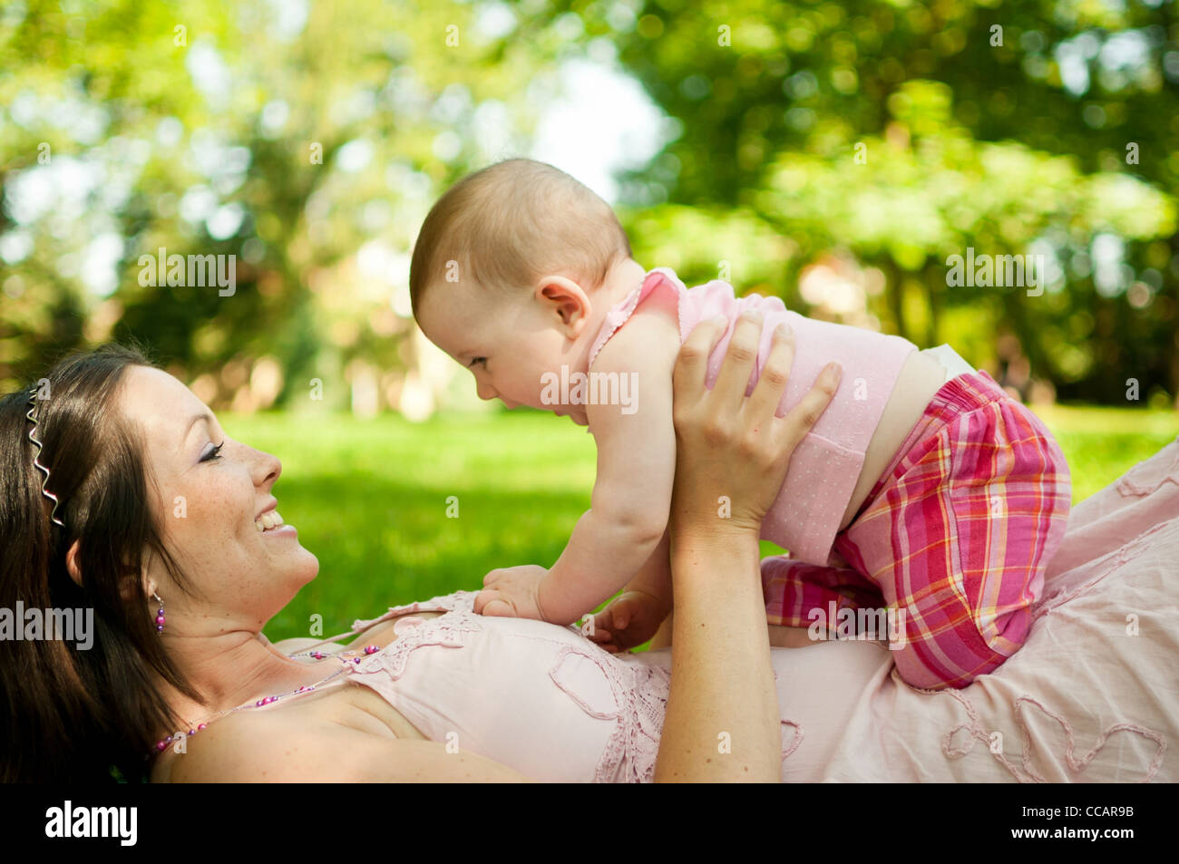 Enjoying life - happy mother with child Stock Photo - Alamy