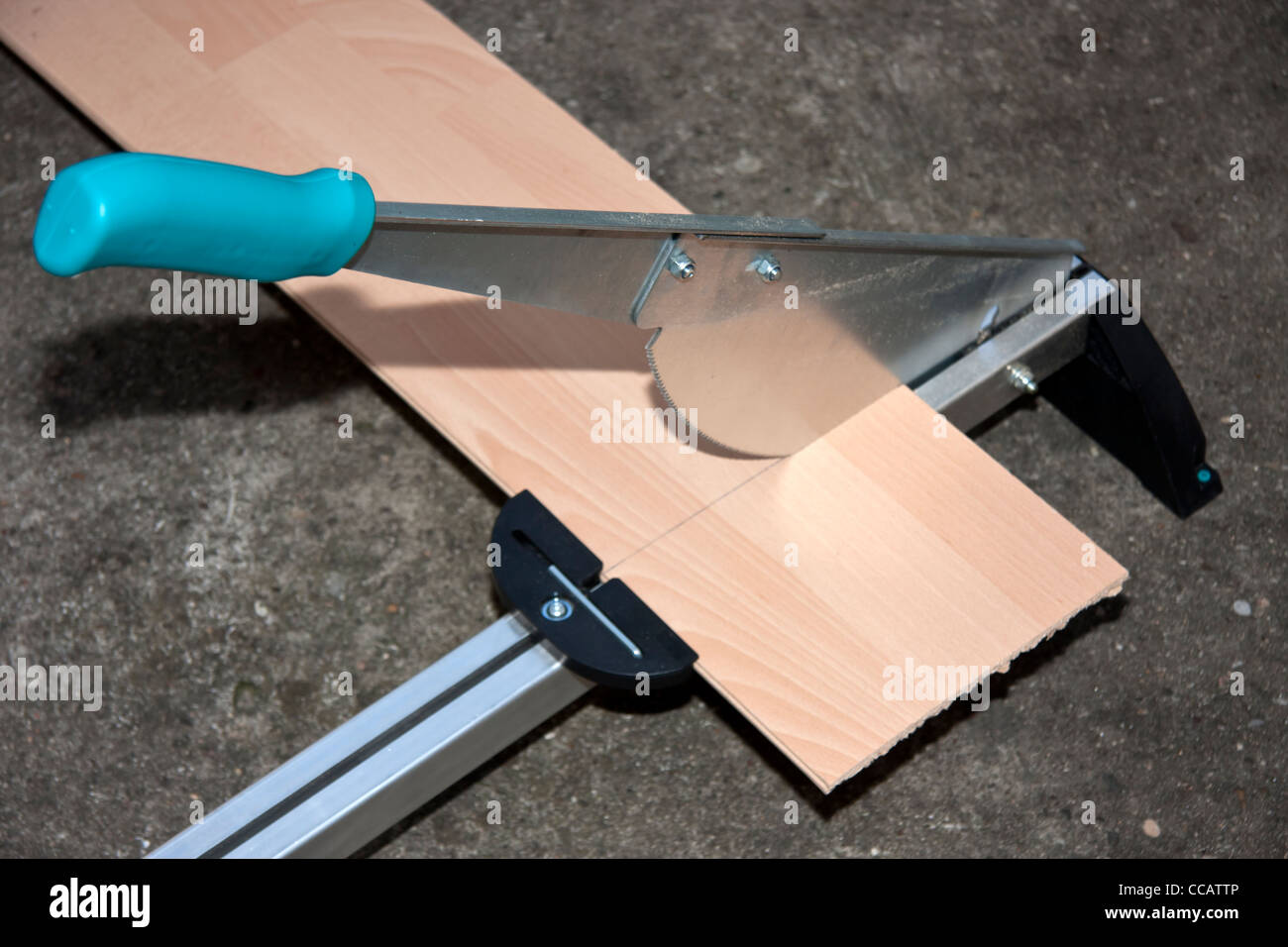 Cutting machine for laminate Stock Photo - Alamy