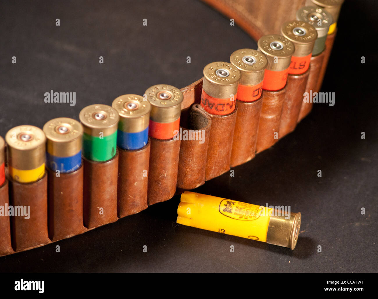 Yellow blank with belt and multicolor bullets Stock Photo - Alamy