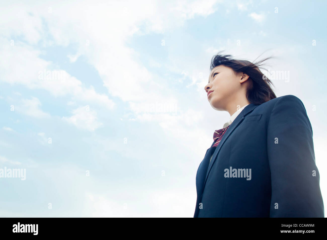 School girl profile school uniform hi-res stock photography and images ...