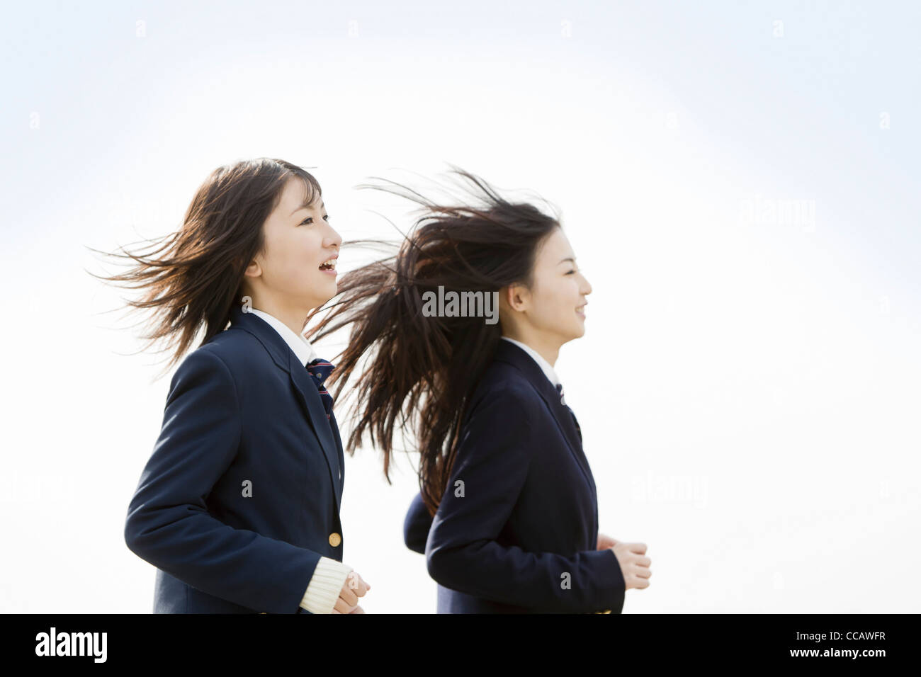 School Teenagers Running Uniform High Resolution Stock Photography and ...