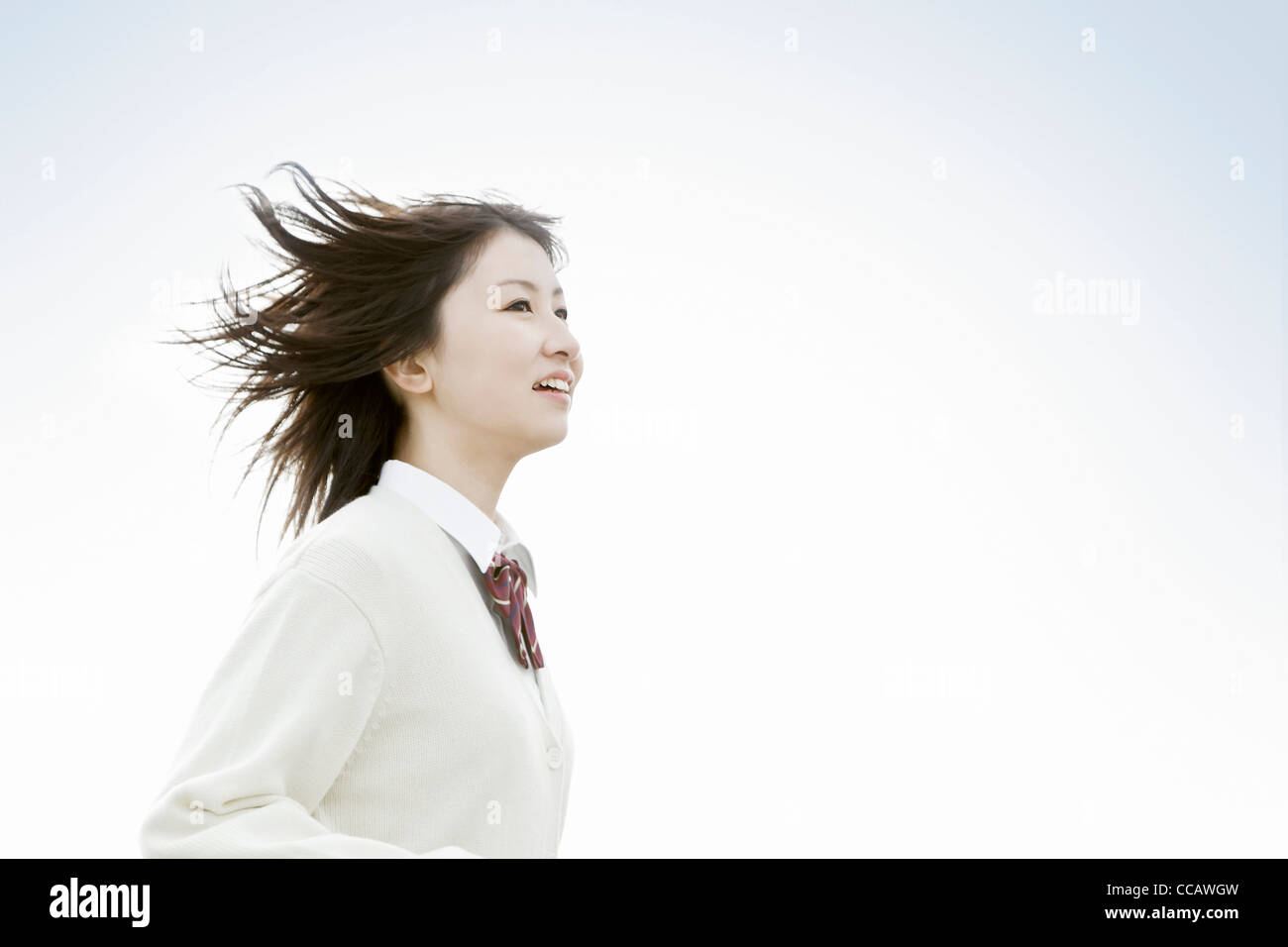 Female Student Running Stock Photo - Alamy