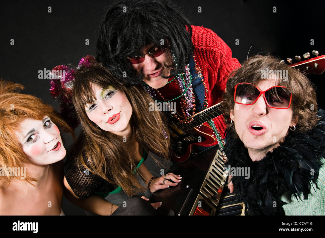 Music band of four youngsters performing Stock Photo - Alamy