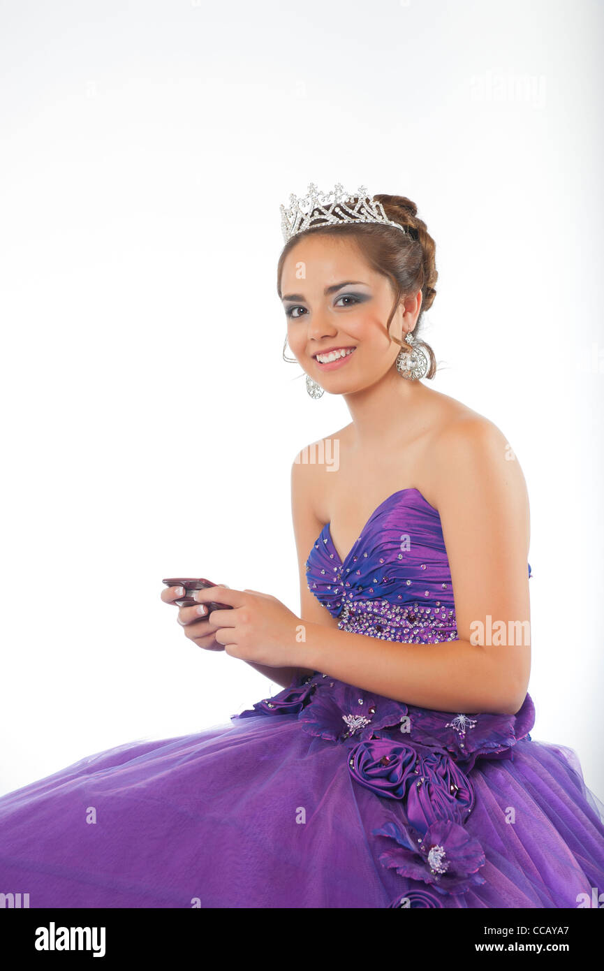 Quinceanera girl texting on her mobile phone Stock Photo - Alamy
