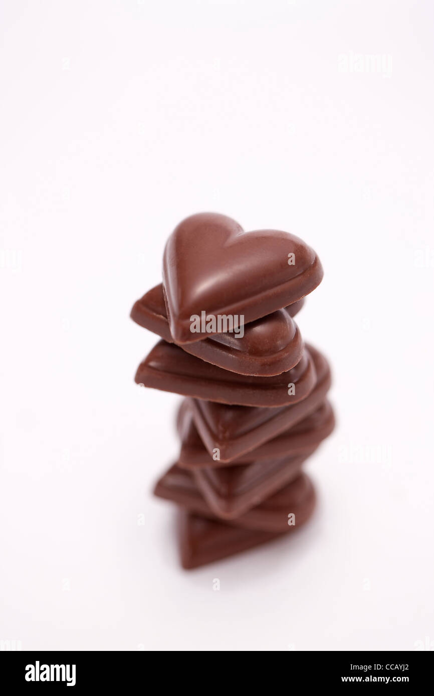 Heart shaped chocolates in stack Stock Photo - Alamy