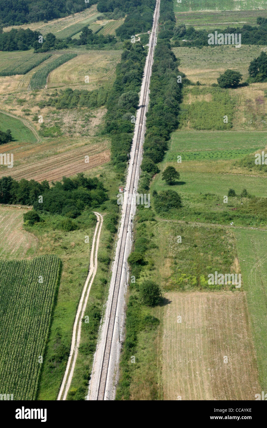 Railroad and green field Stock Photo - Alamy
