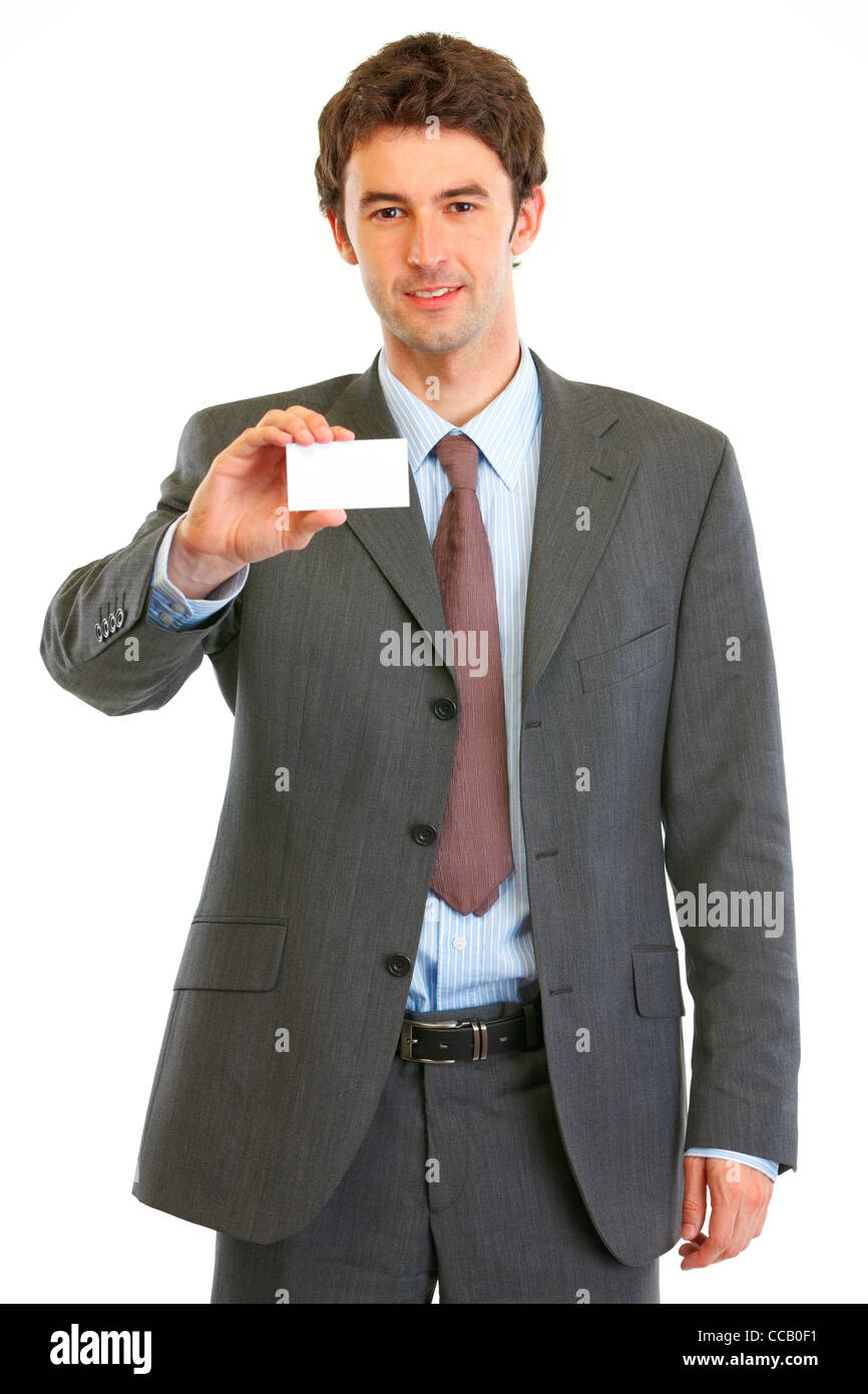 Smiling modern businessman showing business card Stock Photo - Alamy Smiling modern businessman showing business card Stock Photo - Alamy