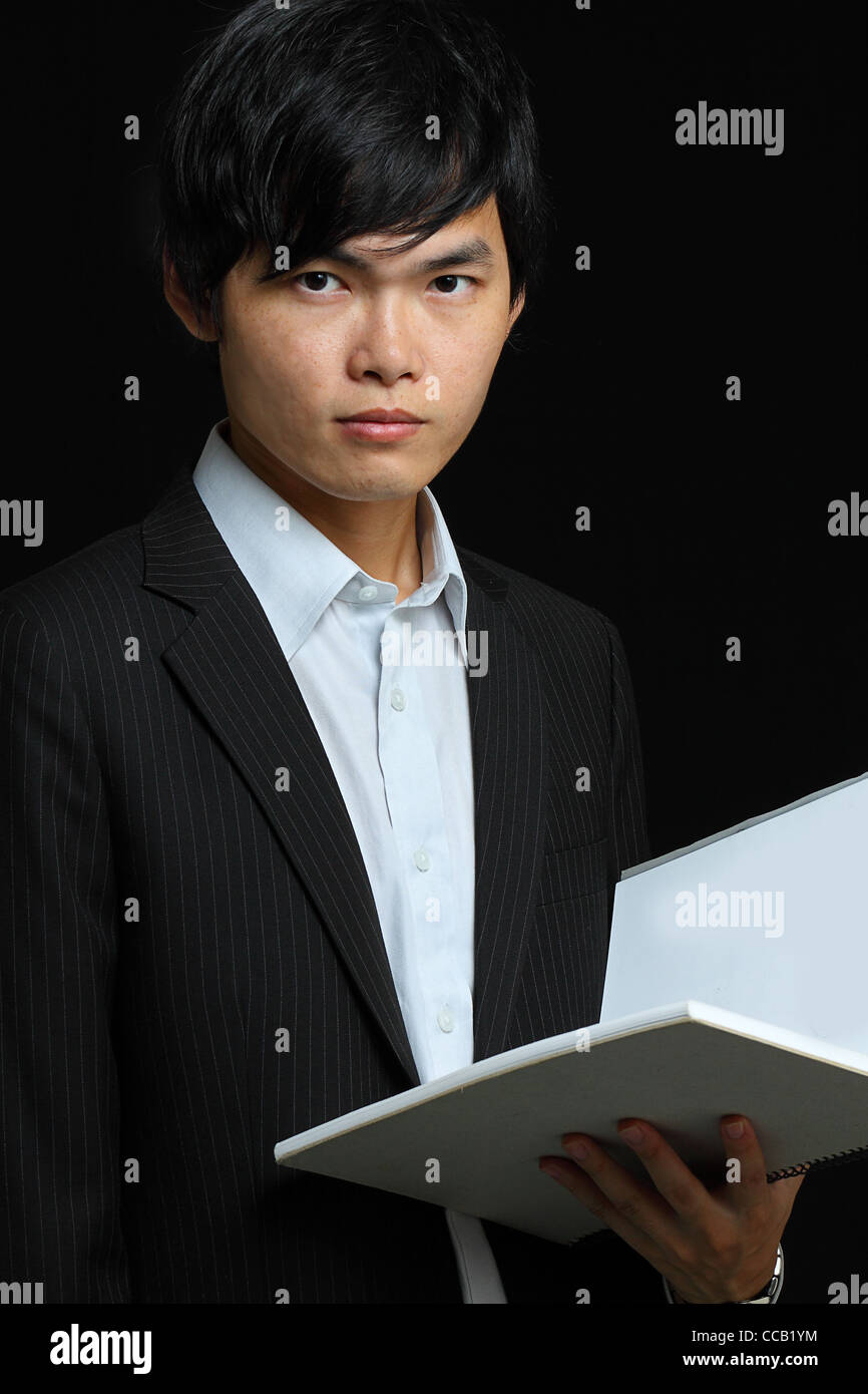 asia man holding folder Stock Photo - Alamy