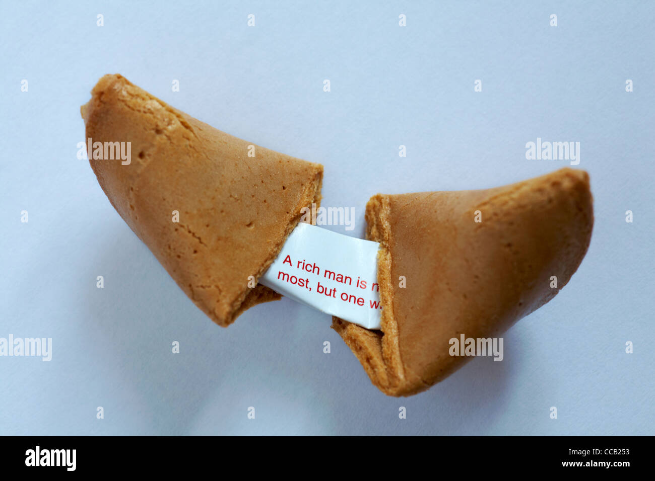 fortune message inside snapped fortune cookie with focus on message ...