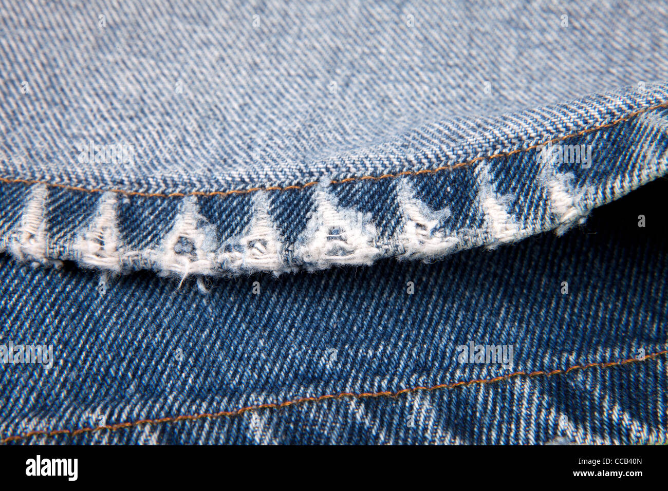 Blue jeans with yellow stitches Stock Photo - Alamy