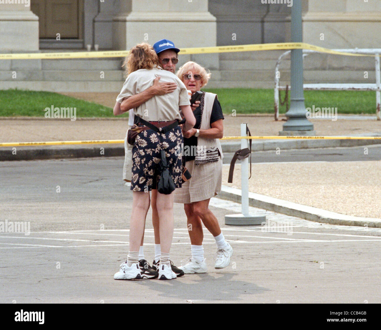 Tourists who witnessed a shooting at the US Capitol Building hug July ...