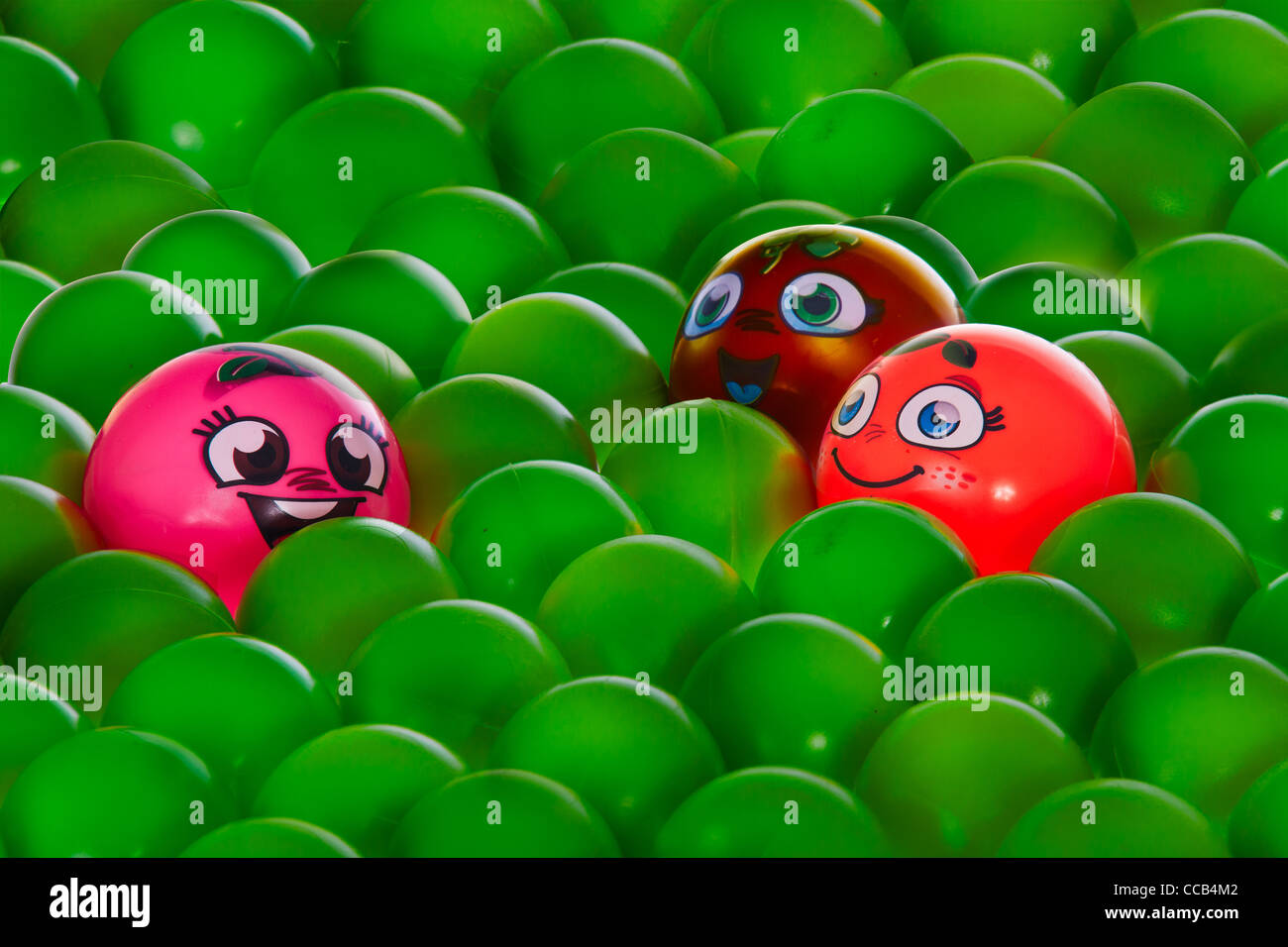A pink happy ball with brown eyes is very happy and communicate with An ...