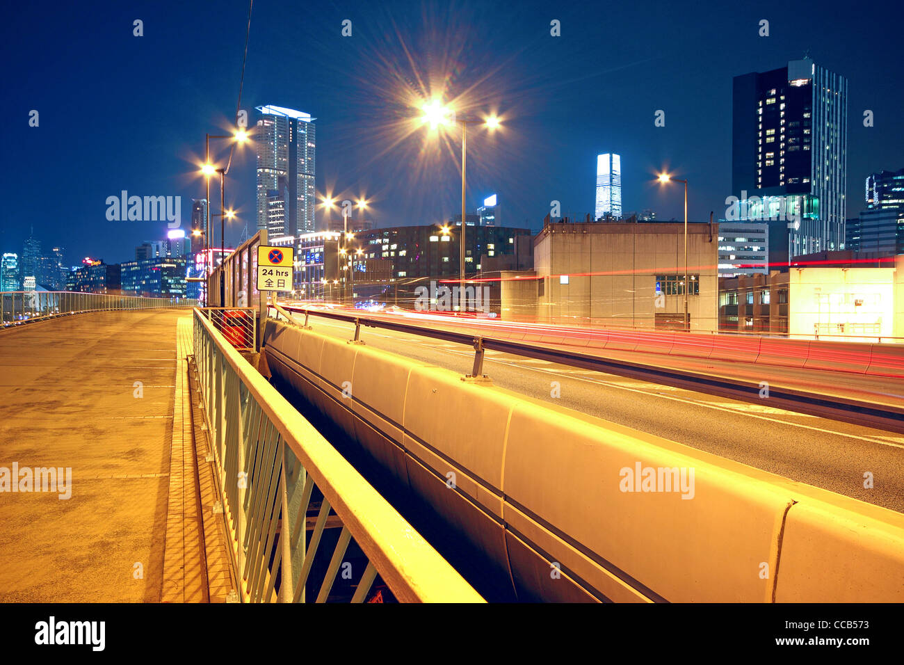 pedestrian overpass and traffic bridge at night Stock Photo - Alamy