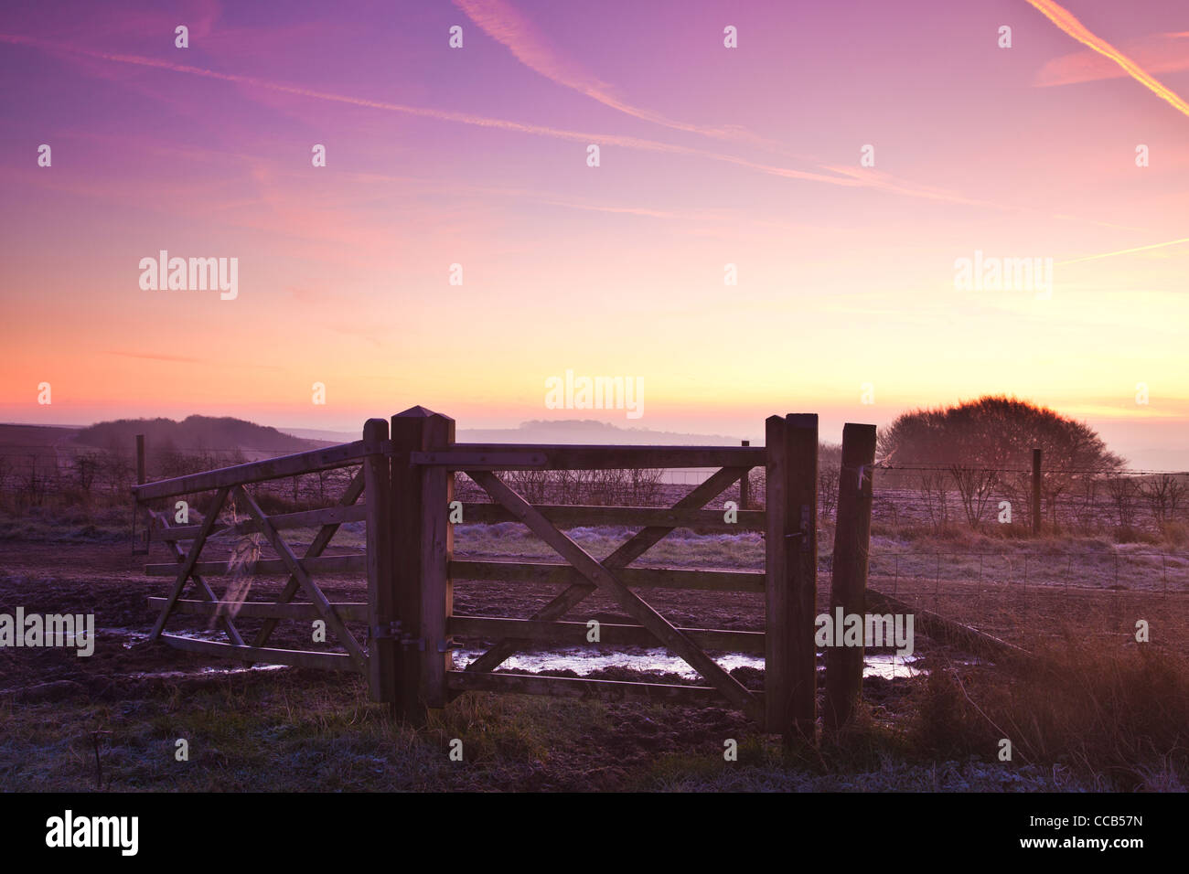 A frosty winter sunrise over the Ridgeway long distance path at Hackpen ...