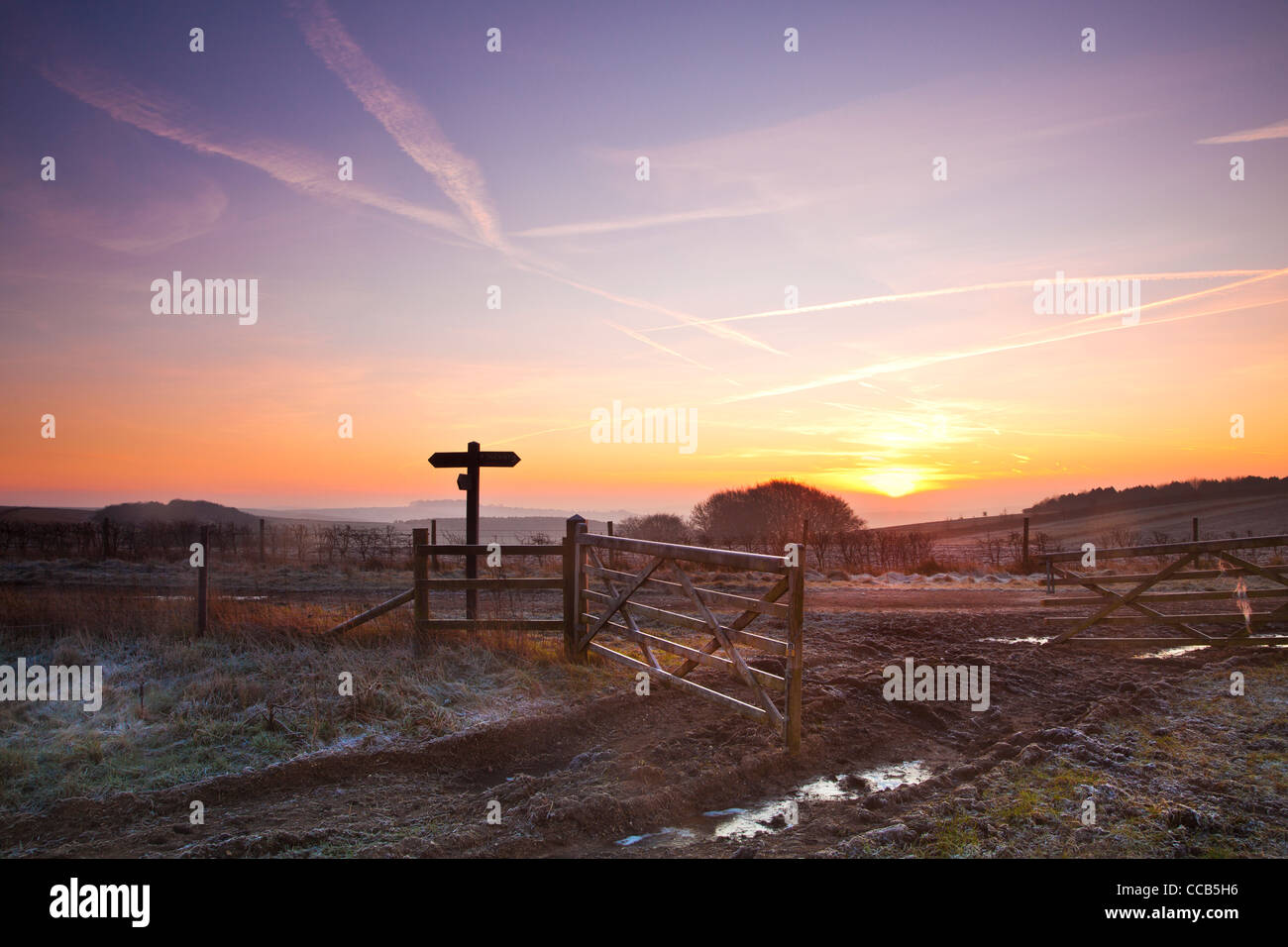 A frosty winter sunrise over the Ridgeway long distance path at Hackpen ...