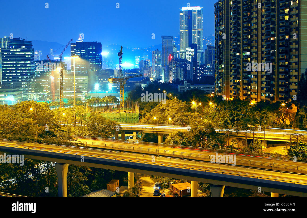 Highway through city in sunset hi-res stock photography and images - Alamy
