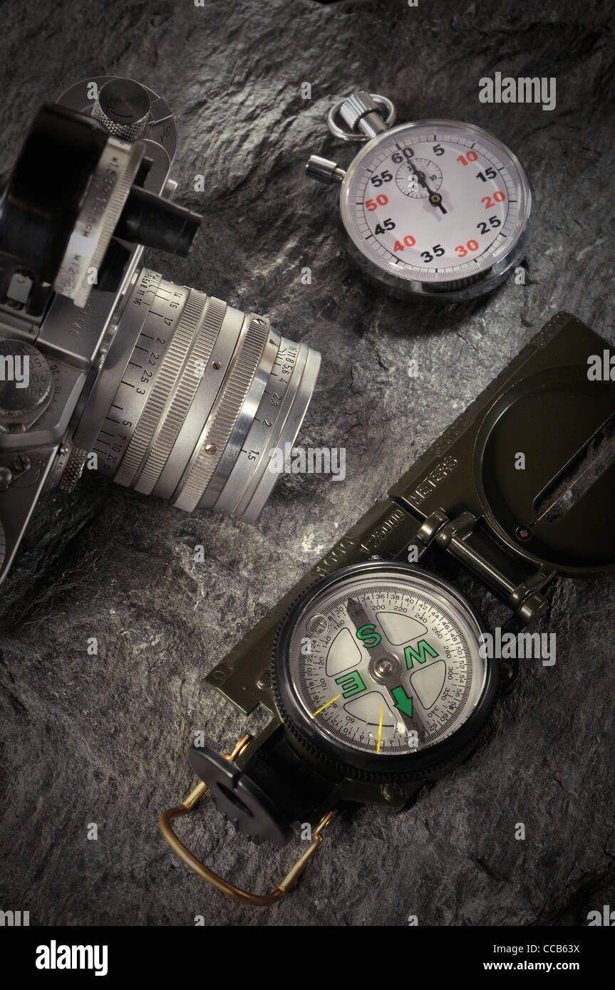 compass and some climbing and adventure equipments on the rock Stock ...