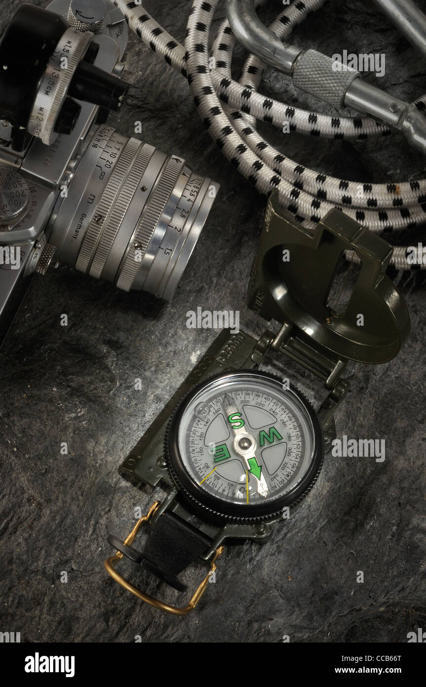 compass and some climbing and adventure equipments on the rock Stock ...