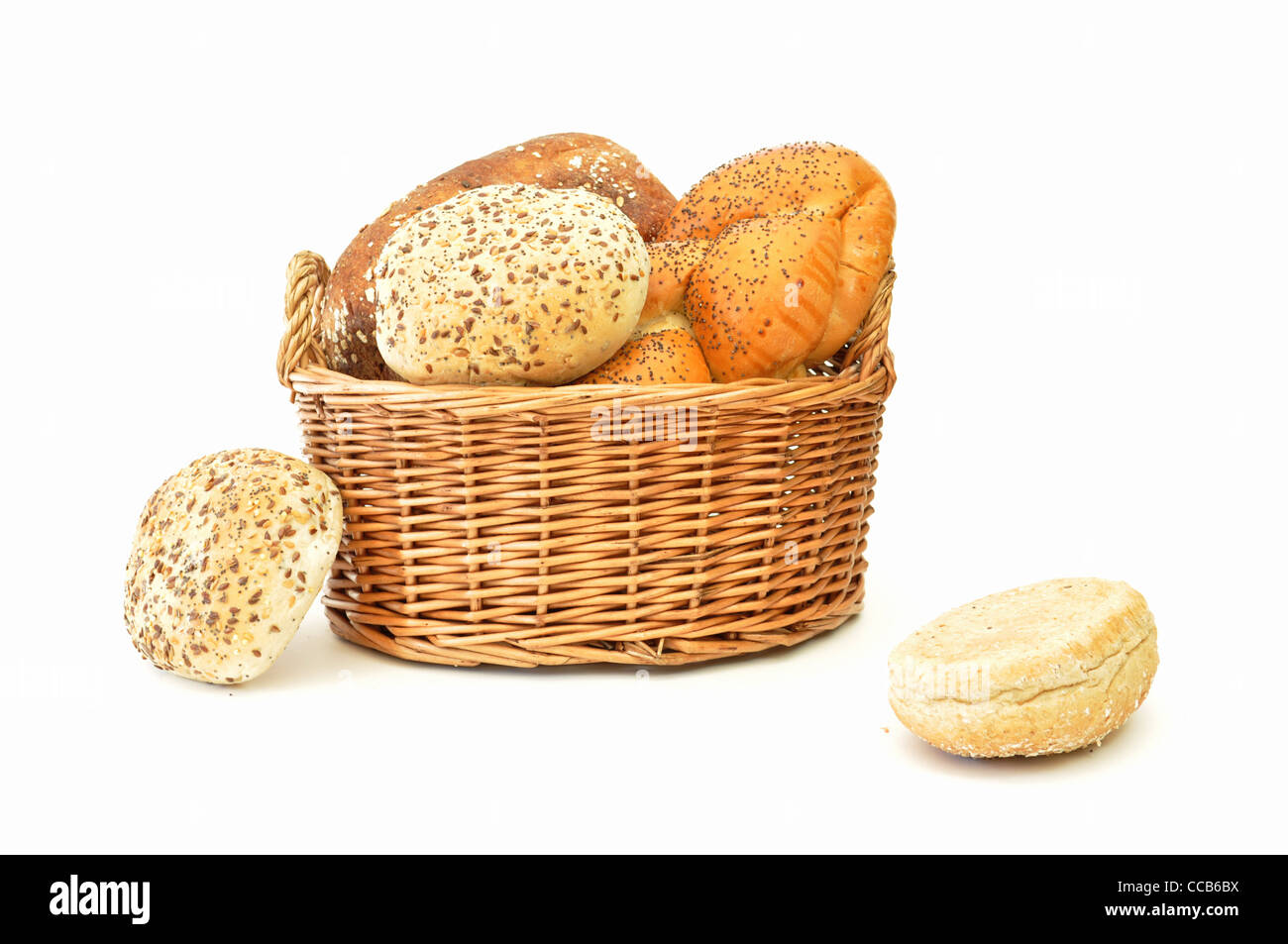 Basket full of bread rolls and loaves Stock Photo - Alamy