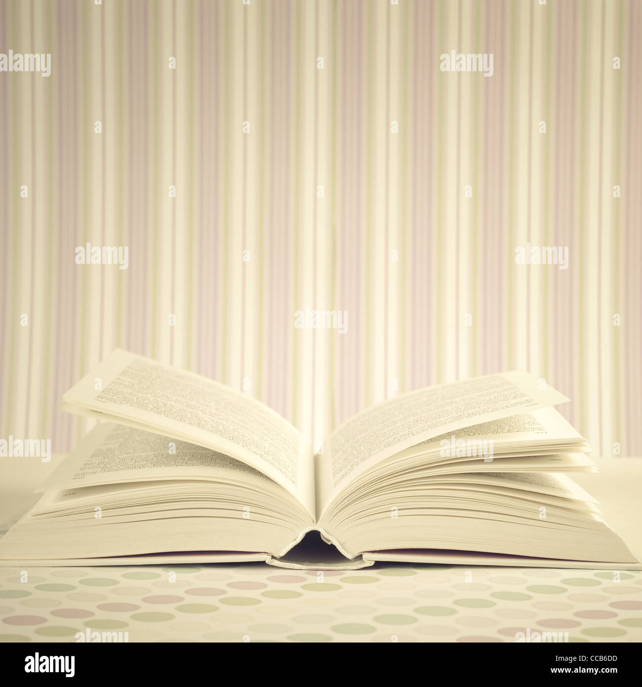 Open vintage book Stock Photo - Alamy