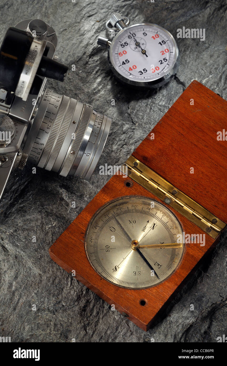compass and some climbing and adventure equipments on the rock Stock ...