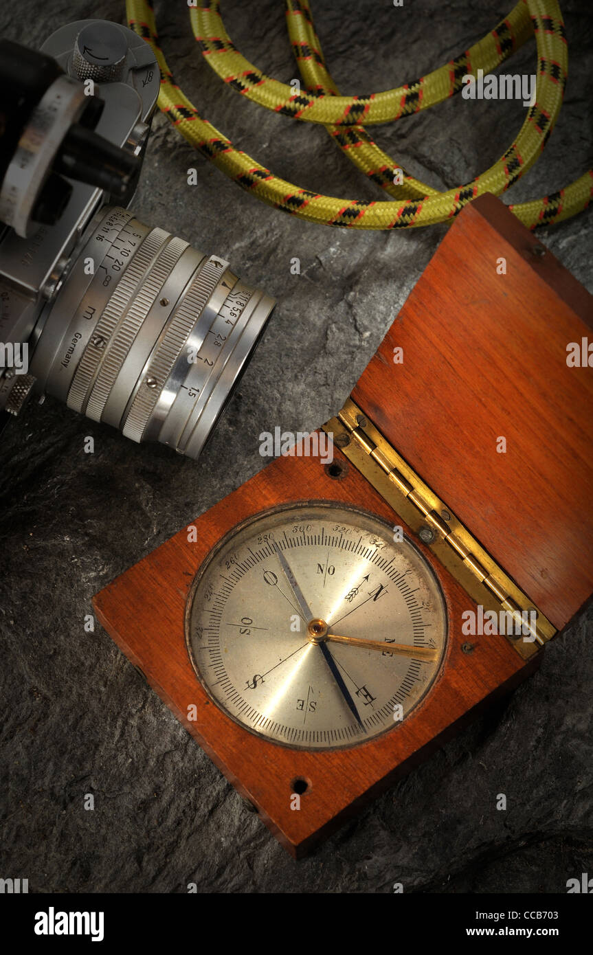 compass and some climbing and adventure equipments on the rock Stock ...