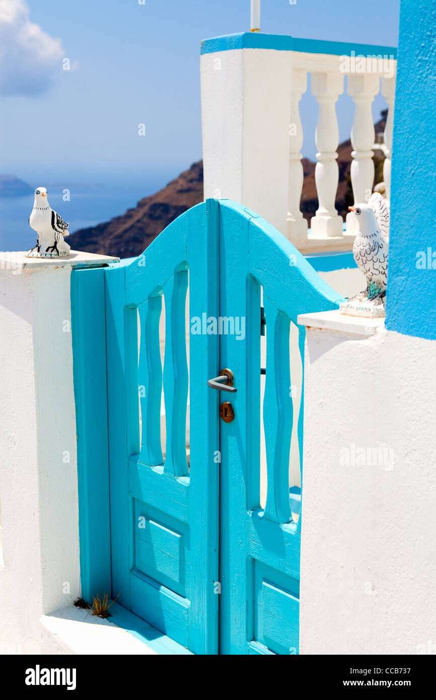 Old turquoise colored wooden gate in Thira, Santorini, Greece Stock ...