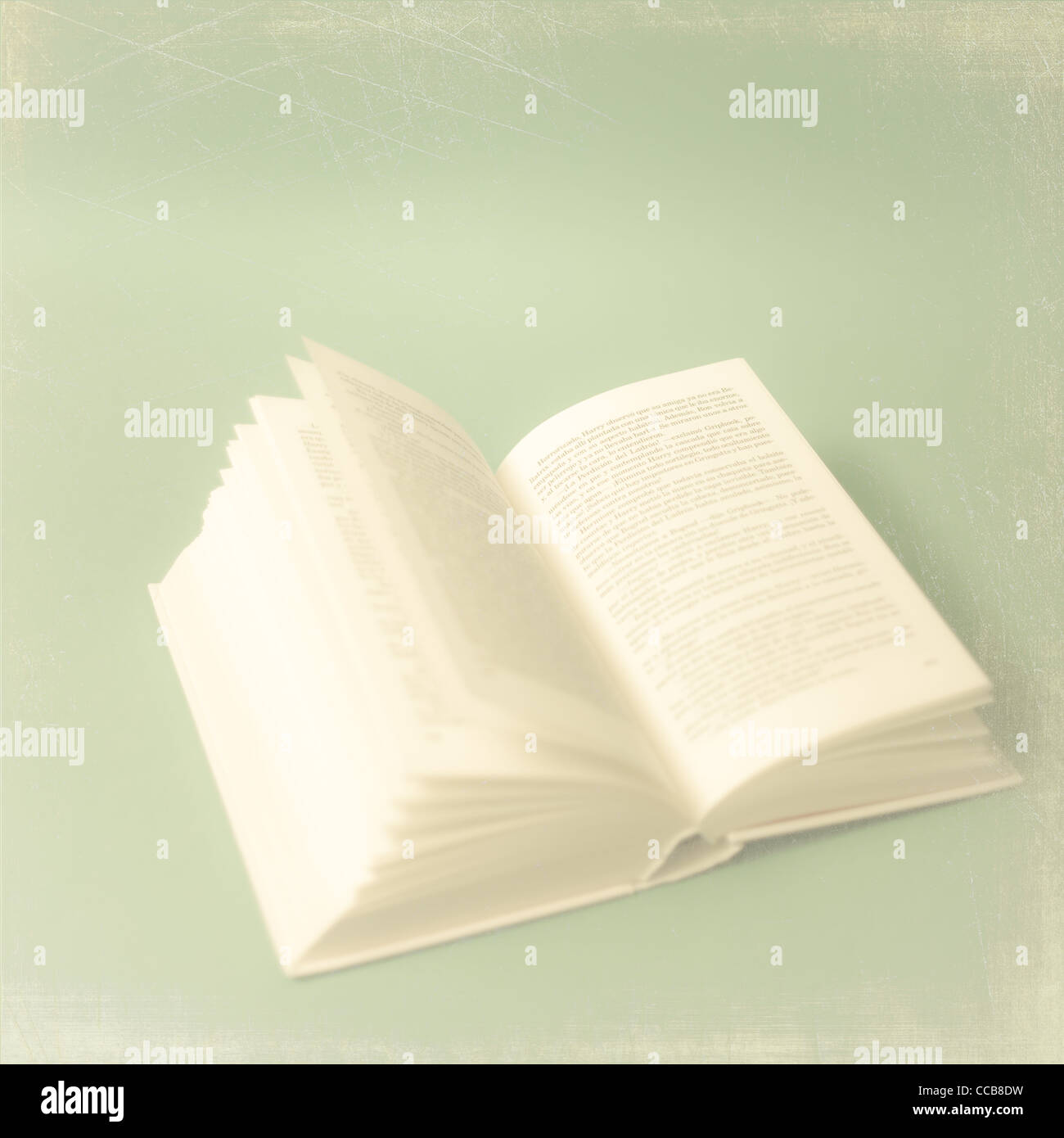 Open vintage book Stock Photo - Alamy