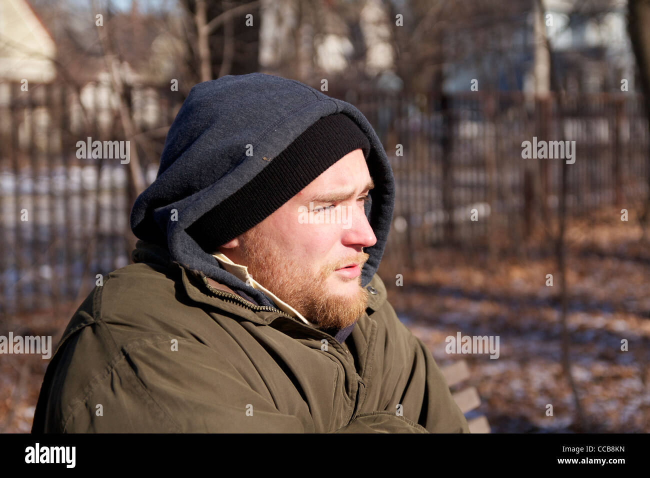Homeless man bench snow hi-res stock photography and images - Alamy