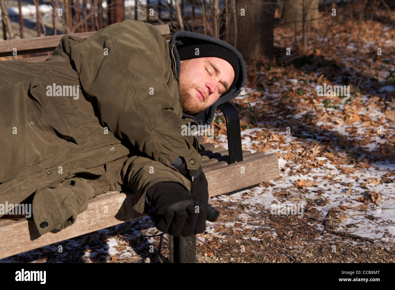 Man Sleeping On Park Bench High Resolution Stock Photography and Images ...